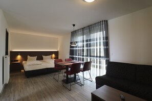 Comfort Appartement | Sala de estar | TV de ecrã plano 