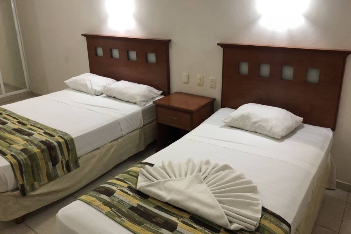 Quarto Triplo, várias camas | Wi-fi grátis