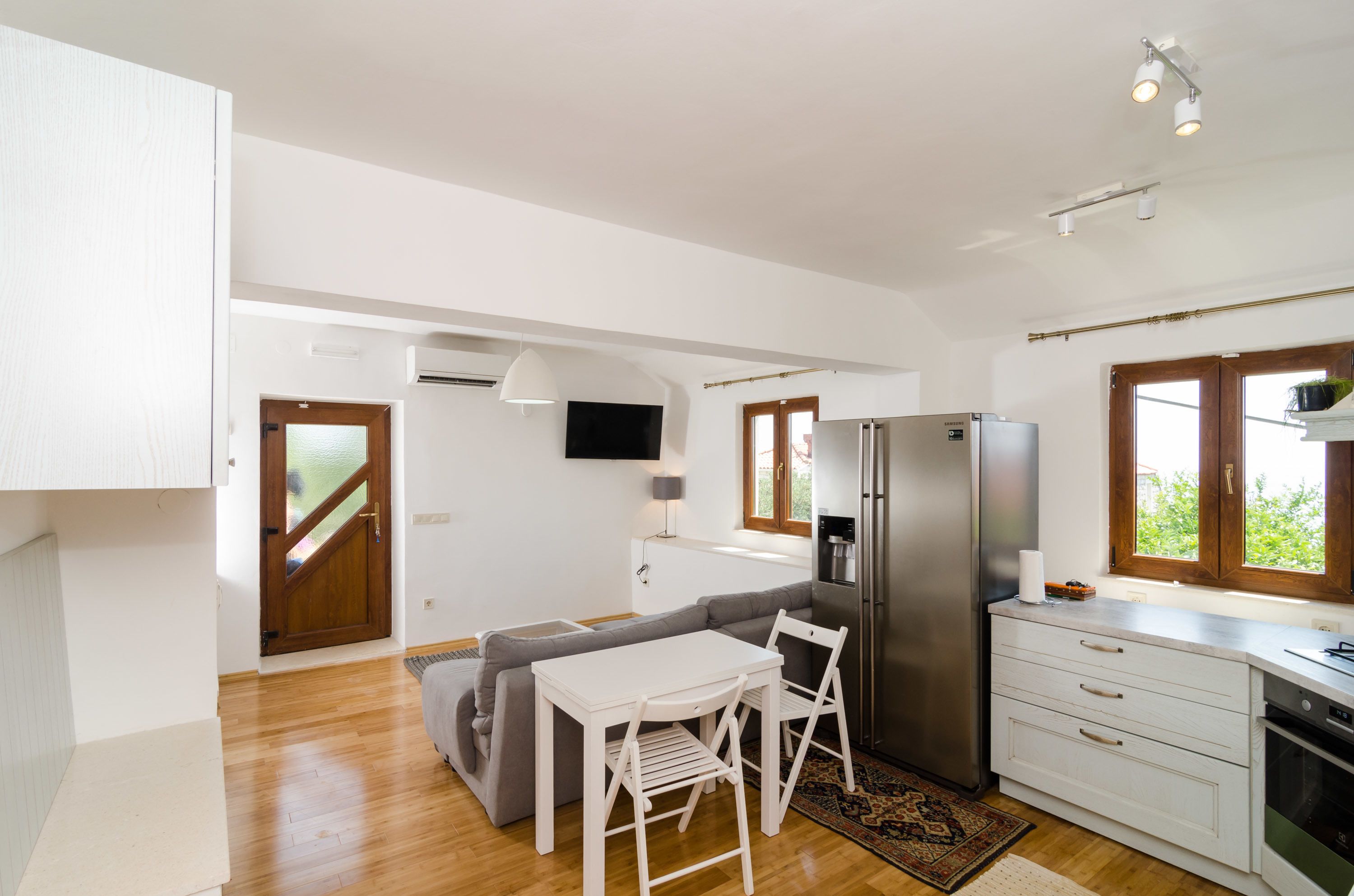 Suite, 2 quartos | Sala de estar | TV de ecrã plano 
