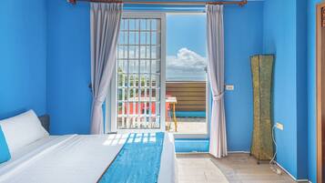 Quarto quádruplo, banheira, vista para o oceano | 1 quarto, individualmente decorados, individualmente mobiliados