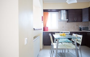 Vila superluxo, 3 quartos, vista para a praia | Cozinha privada | Geladeira grande, micro-ondas, fogão, cooktop