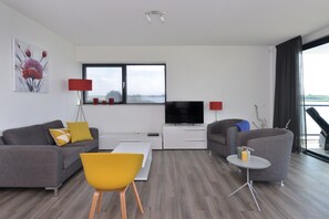Apartamento (Type I) | Sala de estar | TV de ecrã plano, leitor de DVD 