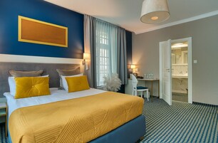 Quarto quádruplo superior, ar-condicionado | Escrivaninha, espaço de trabalho para notebook, cortinas blackout