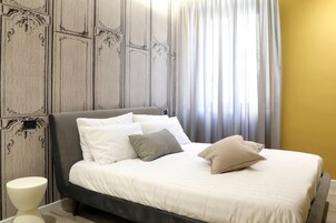 Quarto triplo conforto, vista para a cidade | Edredons de pluma, individualmente decorados, individualmente mobiliados