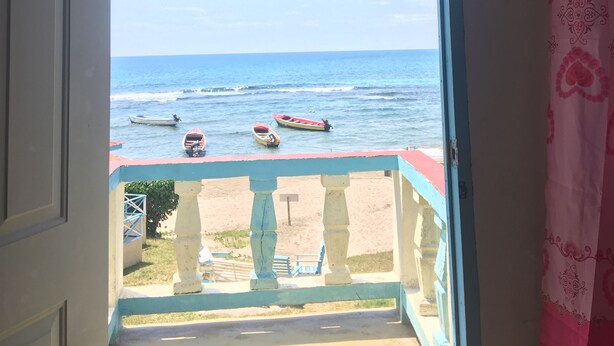 Quarto Triplo, várias camas, vista para a praia