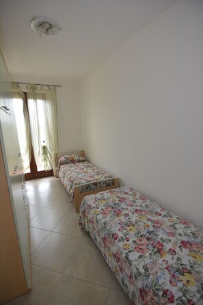 Apartamento, 2 quartos | Ferros/tábuas de passar roupa, berços (sobretaxa)
