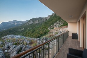 Suite Deluxe, várias camas, vista para a montanha | Varanda