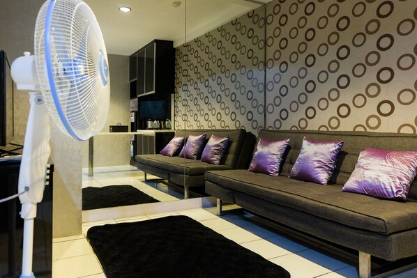 Quarto | Área de estar | TV