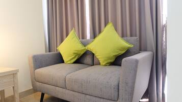 Quarto | Área de estar | TV