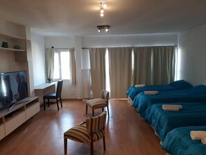 Apartamento (6) | Sala de estar | TV de ecrã plano