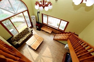 Quarto família | Área de estar | Smart TV