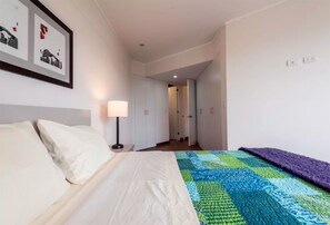 Apartamento família, várias camas | 4 quartos, ferros/tábuas de passar roupa, berços grátis