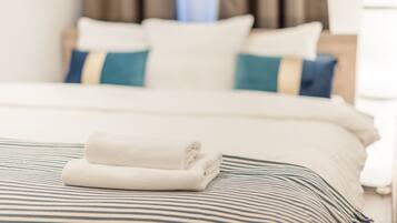 Apartamento, 2 quartos | 2 quartos, escrivaninha, ferros/tábuas de passar roupa