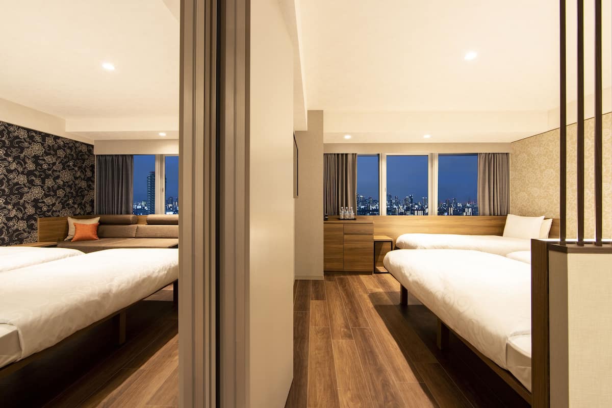 Quarto (High Floor Connect for 4) | 1 quarto, cortinas blackout, Wi-Fi de cortesia, roupa de cama