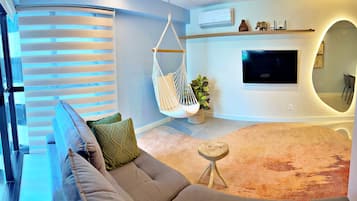 Apartamento (310) | Área de estar | Smart TV 42 polegadas com canais digitais, TV, Netflix