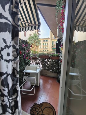 Quarto urbano, suíte | Terra�ço/pátio