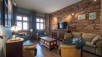 Apartamento Exclusivo (IV) | Sala de estar | Televisor de ecrã plano de 50 polegadas com canais por cabo