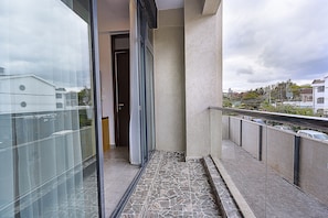 Suite Executiva, 1 cama king-size, Vista para a cidade | Terraço/pátio interior