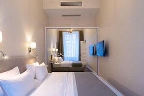 Apartamento standard, 1 cama Queen e sofá-cama, vista para o pátio | Roupas de cama de algodão egípcio, roupas de cama premium