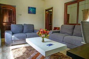 Quarto executivo | Frigobar, cofres nos quartos, escrivaninha