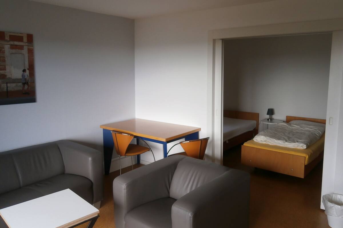 Quarto Twin Comfort, junto à encosta | 1 quarto, secretária, Wi-fi grátis, roupa de cama fornecida
