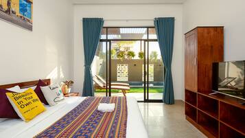 Quarto Duplo Júnior, vista para a piscina | Terraço/pátio interior