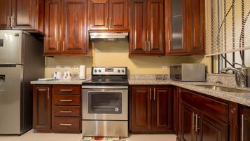 Apartamento de Luxo, várias camas | Pormenores do interior