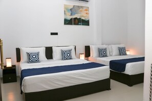 Quarto Quádruplo de Luxo, várias camas, vista para o jardim | Cortinas/cortinados opacos, quartos insonorizados 