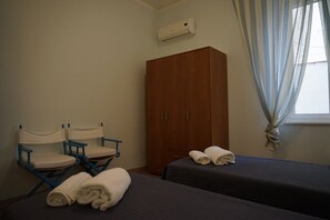 Apartamento, 4 quartos | Comodidade do quarto