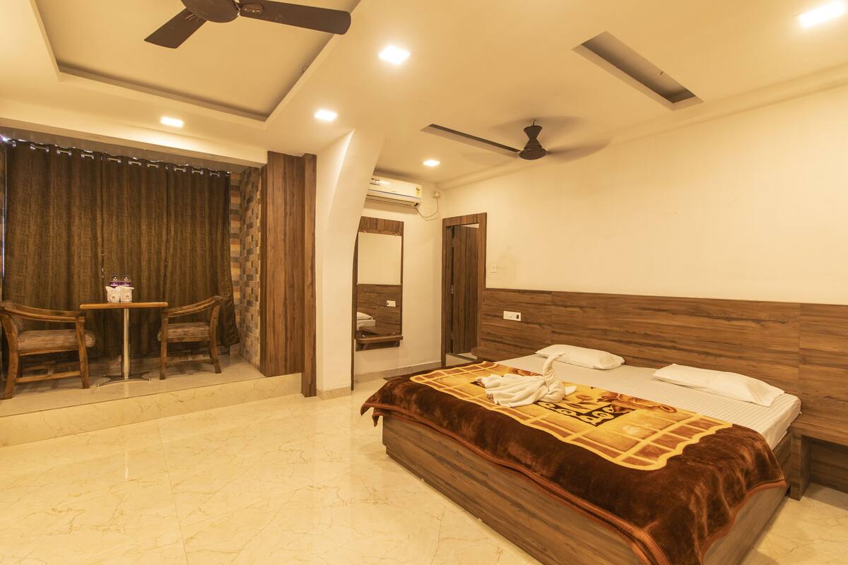 Quarto luxo (AC) | 1 quarto, individualmente mobiliados, Wi-Fi de cortesia, roupa de cama