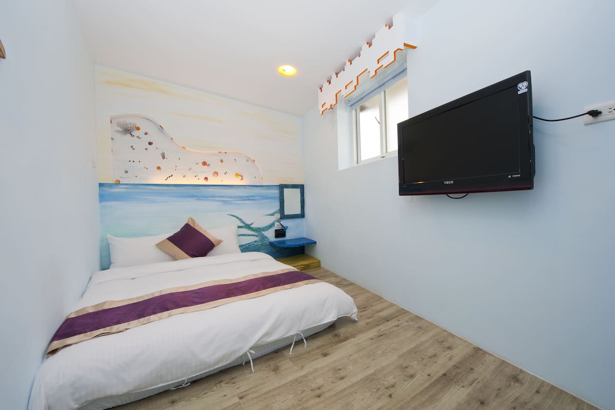 Quarto Quádruplo Familiar, 2 camas de casal, vista para o oceano | Secretária, quartos insonorizados, camas desdobráveis, Wi-fi grátis