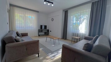Apartamento, 1 quarto | 1 quarto, secretária, cortinas/cortinados opacos 