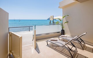 Suíte estúdio, vista para o mar | Cofres nos quartos, Wi-Fi de cortesia, roupa de cama