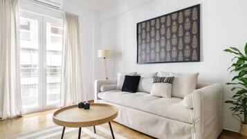 Apartamento, 2 quartos, Vista para a cidade | Sala | Smart TV, Netflix, serviços de streaming