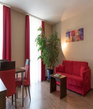 Apartamento | Área de estar | TV de tela plana