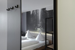 Roupas de cama antialérgicas, cofres nos quartos