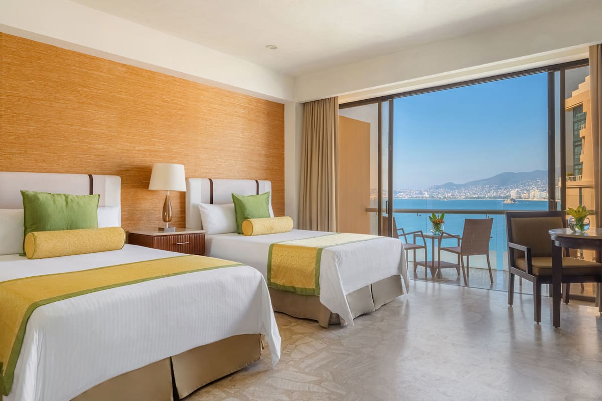 Quarto Deluxe, 2 camas de casal, vista parcial para o oceano (Preferred Club) | Minibar, cofre com capacidade para portátil