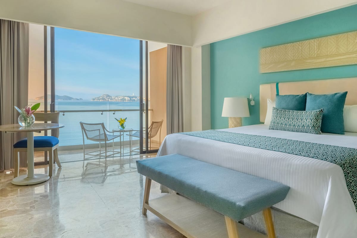 Quarto Deluxe, 1 cama king-size, vista para o oceano | Minibar, cofre com capacidade para portátil