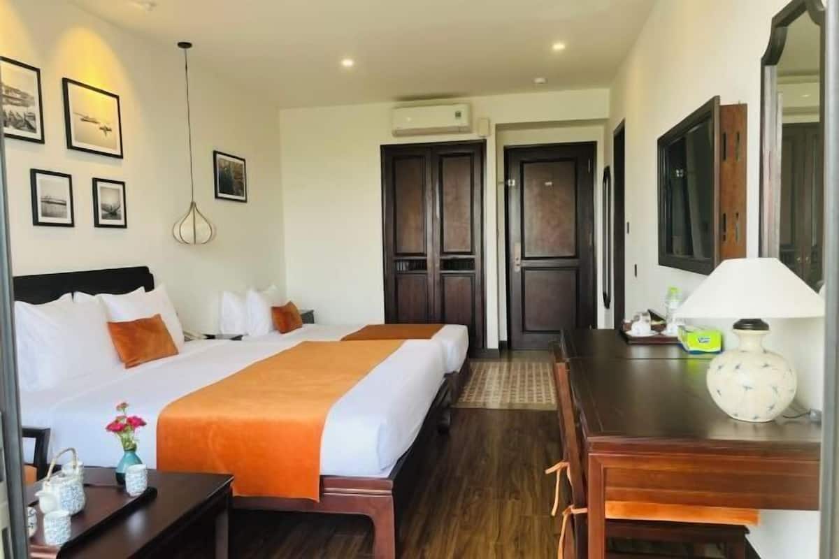 1 quarto, roupa de alta qualidade, camas de colchão pillowtop, minibar