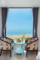 Quarto Duplo Deluxe, vista para o mar | Roupa de alta qualidade, camas de colchão Select Comfort, minibar