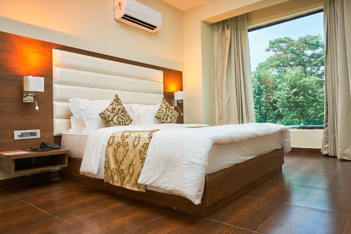 Quarto executivo, 1 cama King, para não fumantes, vista para a montanha | Roupas de cama premium