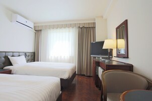 Quartos à prova de som, Wi-Fi de cortesia, roupa de cama