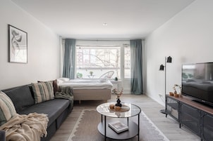 Apartamento Cidade, varanda, Vista para a cidade | Sala de estar | Televisor LED