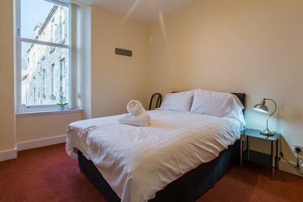 Apartamento, várias camas | Ferro/tábua de engomar, Wi-fi grátis, roupa de cama fornecida