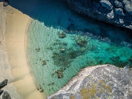 Na praia, praia de areia branca 