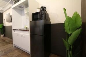 Quarto Superior | Cozinha privada | Um frigorífico, um micro-ondas, uma placa de cozinha 