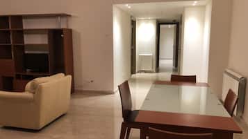 Apartamento família, 2 quartos | Área de estar