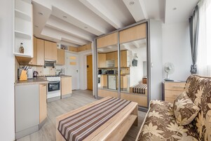 Apartamento (32/47) | Espaço de trabalho para notebook, ferros/tábuas de passar roupa