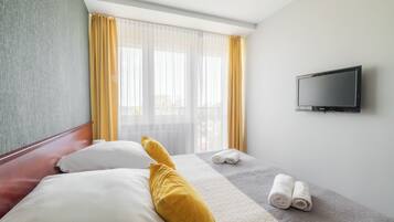 Quarto casal standard, 2 camas de solteiro | Wi-Fi de cortesia, roupa de cama