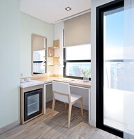 Quarto Duplo ou Twin Premier, vista parcial para o oceano | Comodidade do quarto